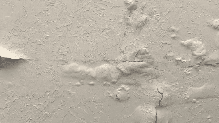 Deakling water damage causes water bubbling on the ceiling of your home